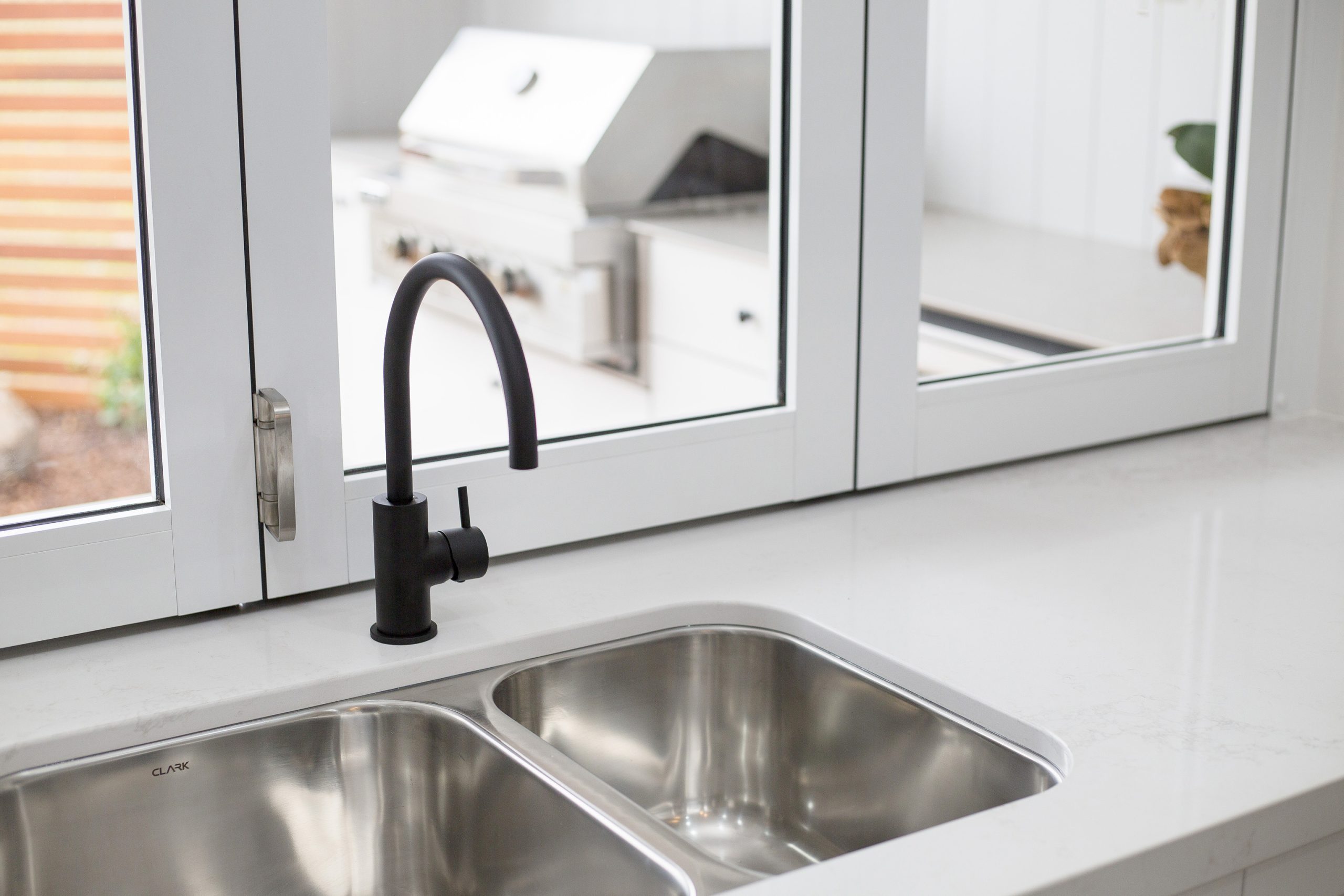 The Kitchen Debate - Undermount or Overmount Sink? - Kookaburra Homes